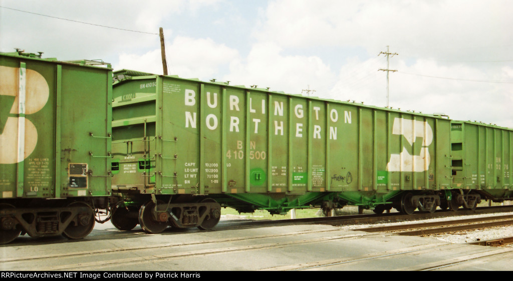 BN 410500 50 airslide moving south across Florida Avenue into NS Oliver Yard in New Orleans LA ...